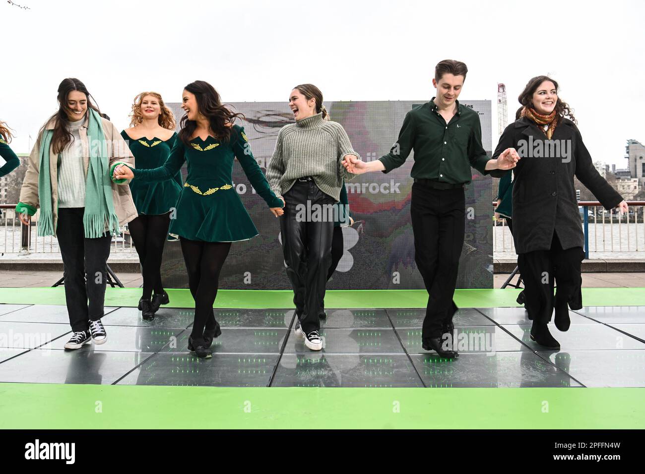 EDITORIAL USE ONLY Passers-by get dancing lessons as Irish dancers ...