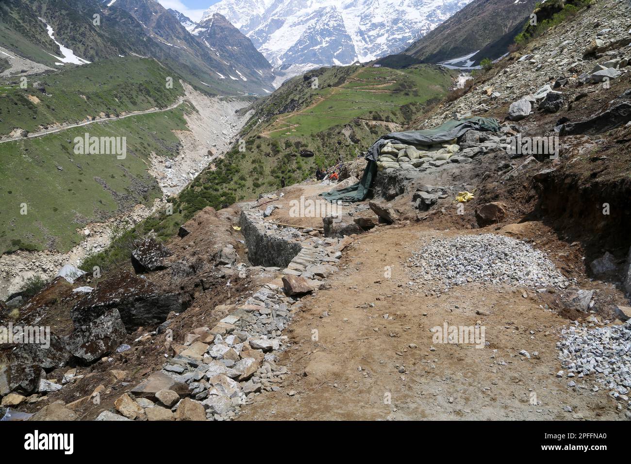 Rudarprayag, Uttarakhand, India, June 17 2014,Laborer building safety ...