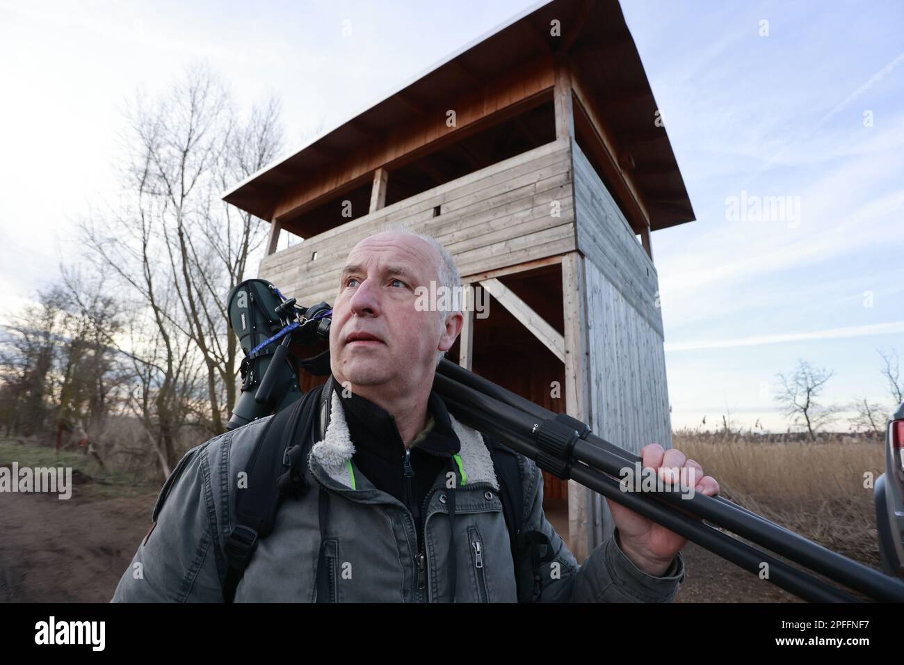 Frose, Germany. 17th Mar, 2023. Hobby ornithologist Uwe Nielitz stands ...