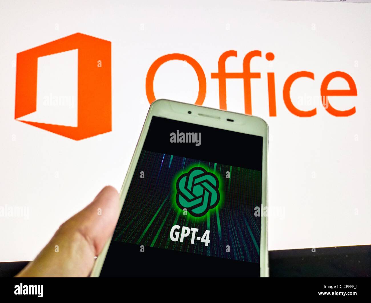 SUQIAN, CHINA - MARCH 17, 2023 - A citizen uses his mobile phone to check GPT-4 embedded Office ...