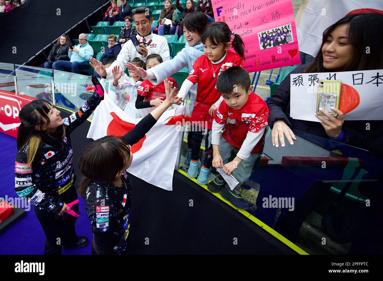 Team Fujisawa celebrate their victory with some Japanese fans in the ...