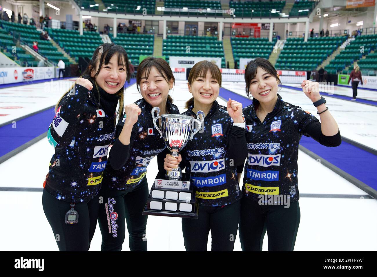 Team Fujisawa pose with the trophy after their victory in the final of ...