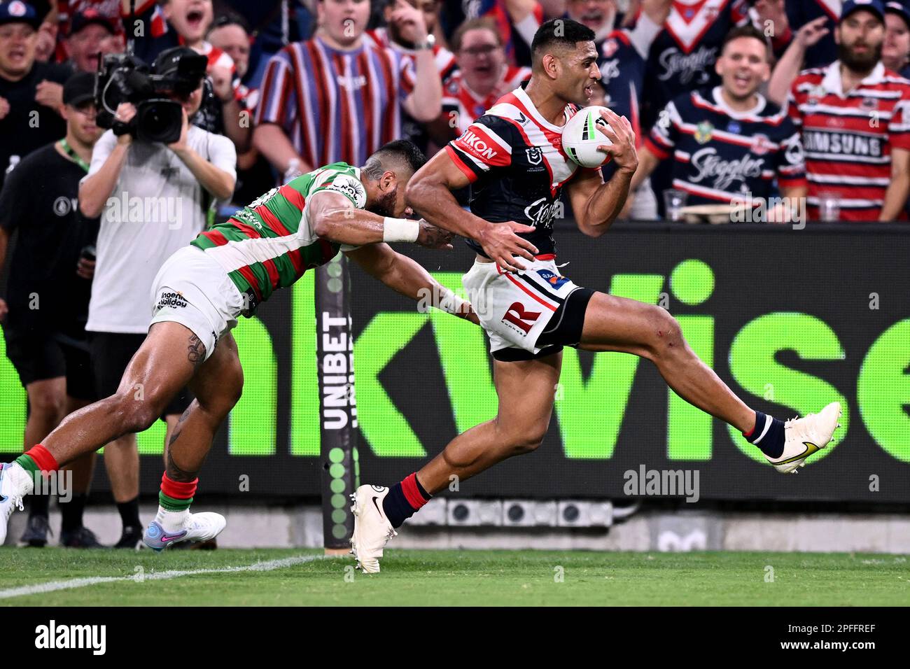 Daniel Tupou of the Roosters scores a try during the Round 3 NRL match ...