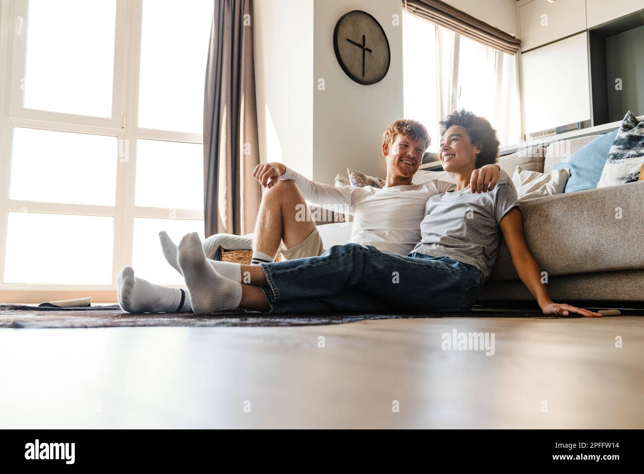 Leaning in couch hi-res stock photography and images - Alamy