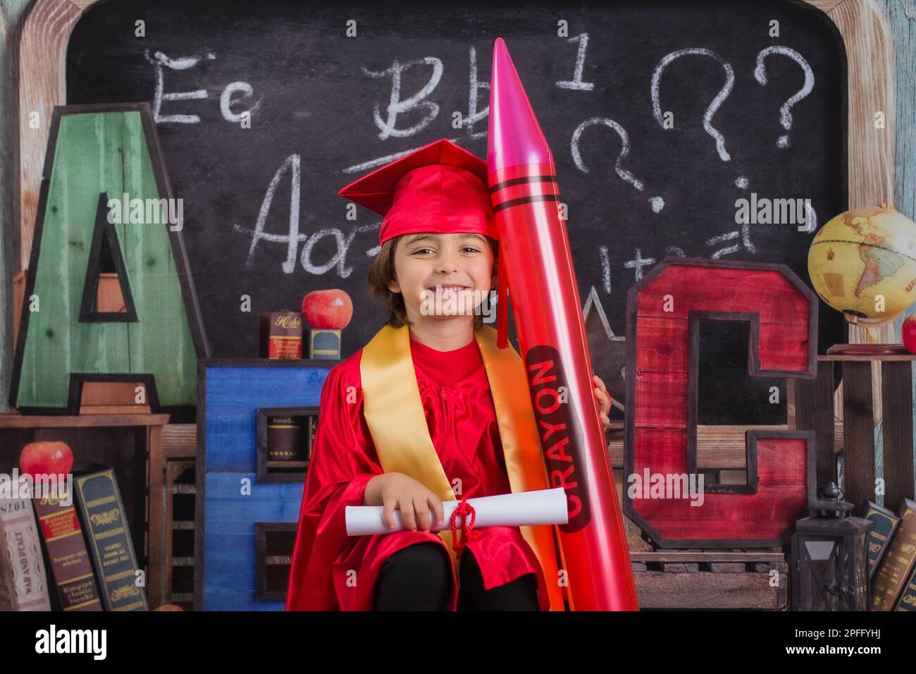 An adorable little boy holding a VPK diploma during kindergarten ...
