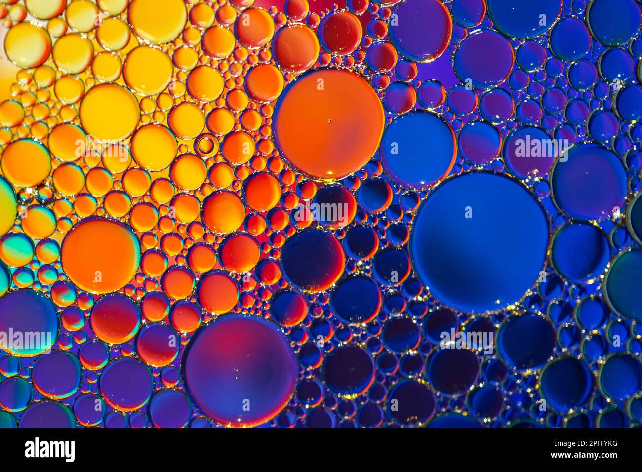 multi colored oil circles on the water, colorful background Stock Photo ...