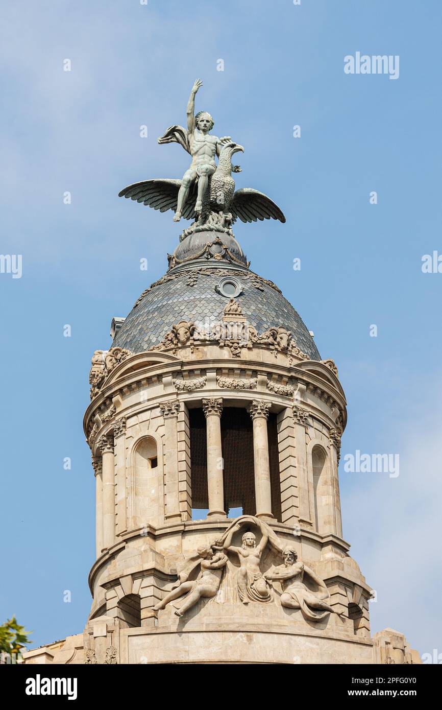 The Dome and top Statues of La Union and el Fenix on Passeig de Gracia ...