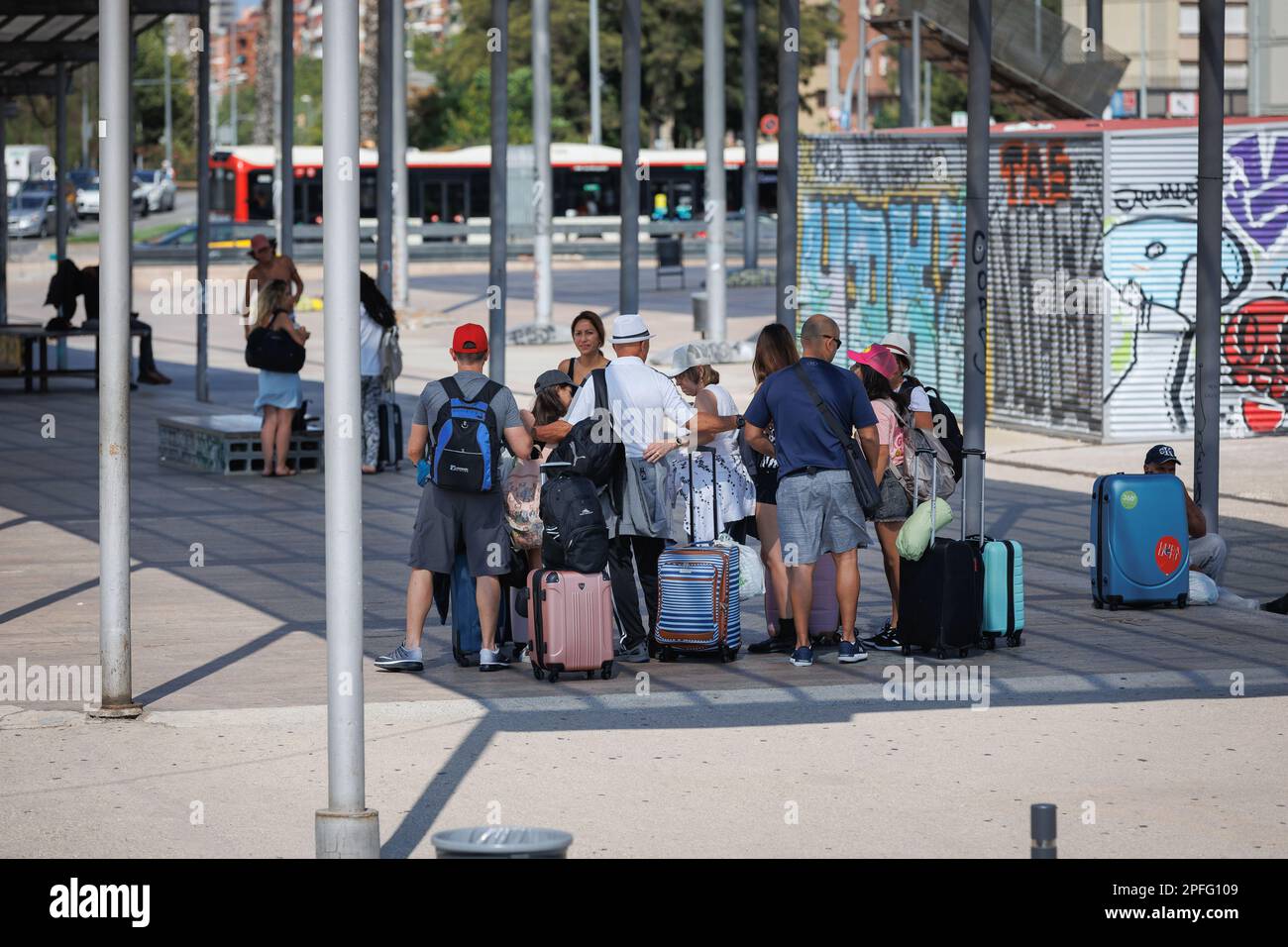 Large Family Greeting each other before a Trip outside the Station with ...