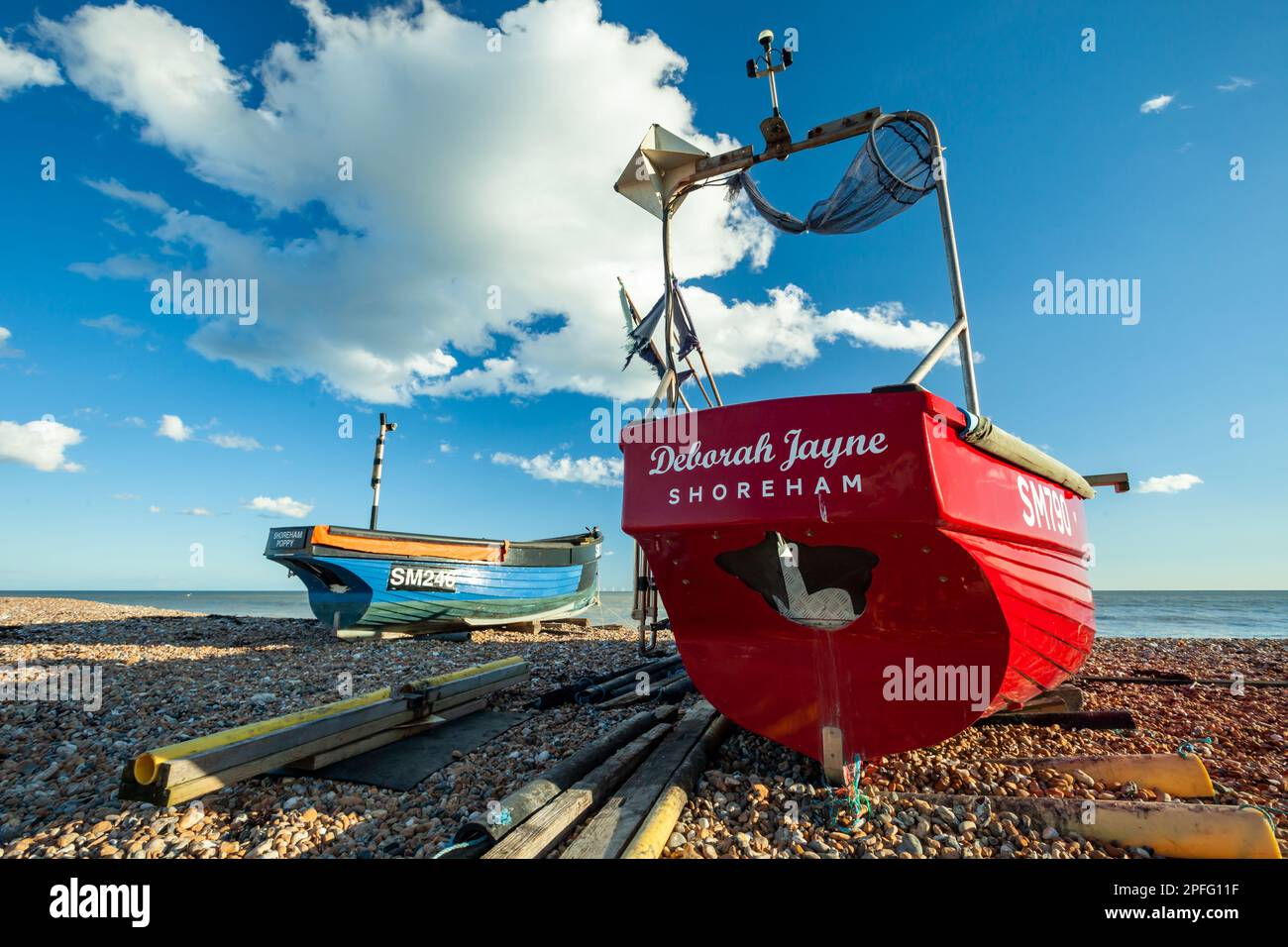 Red fishing boat hi-res stock photography and images - Alamy