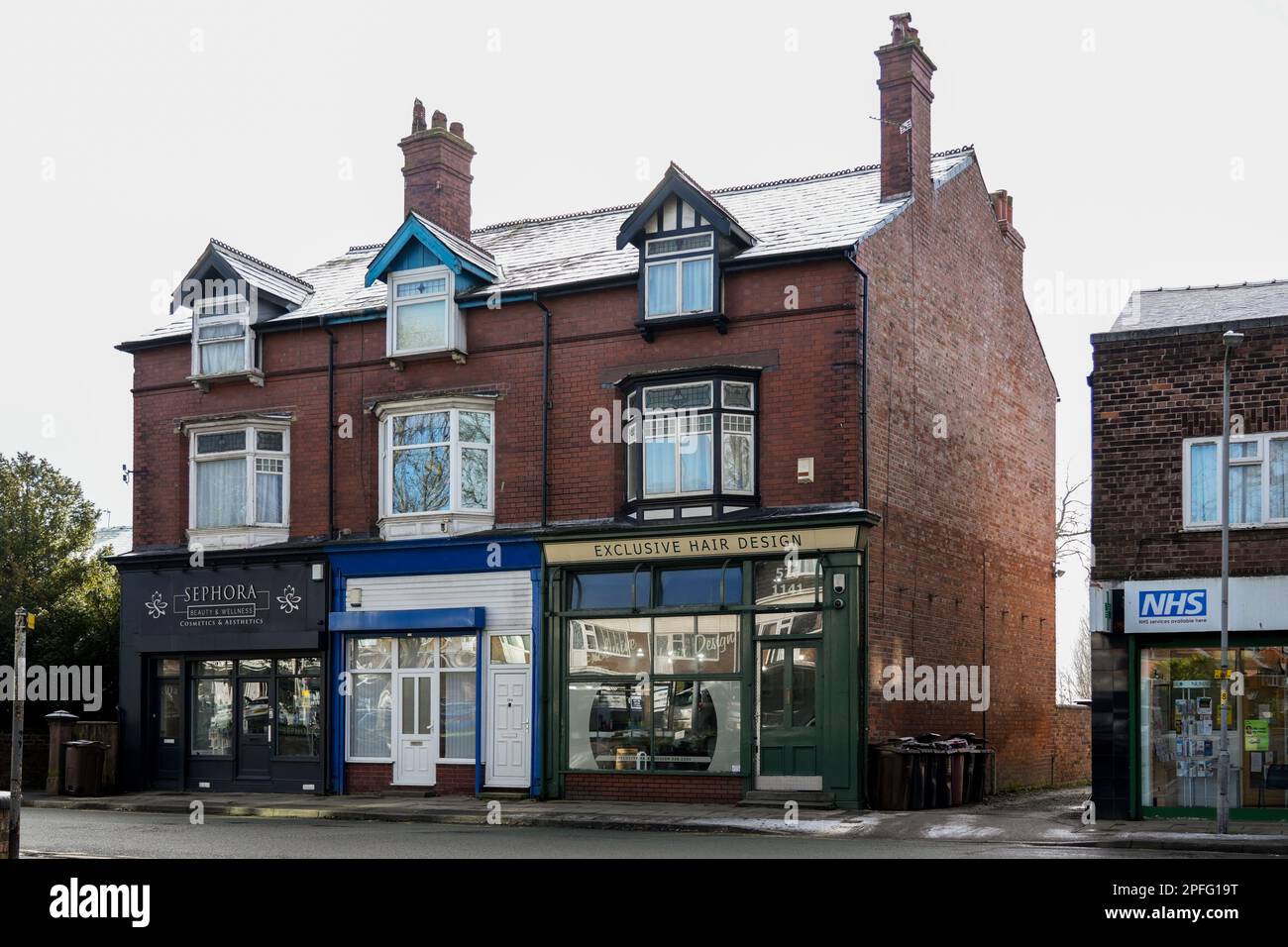 Maghull Station Shops Stock Photo - Alamy