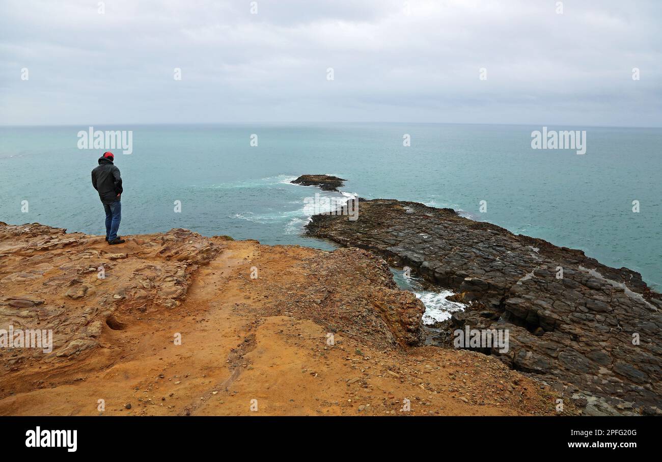 Tourist on Slope Point, New Zealand Stock Photo - Alamy