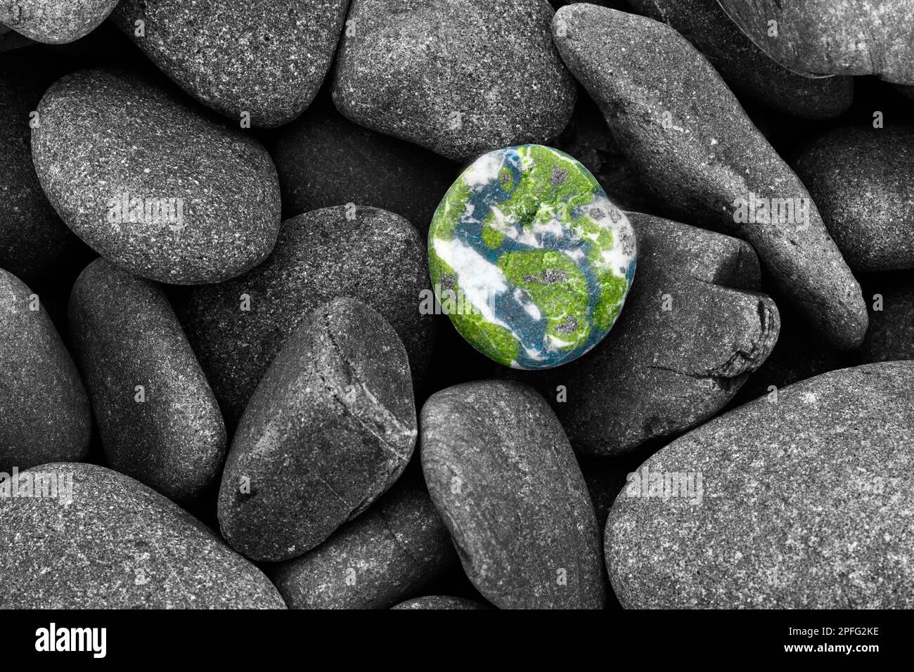 Close up deetails of stones worn into smooth shapes by the tidal ...