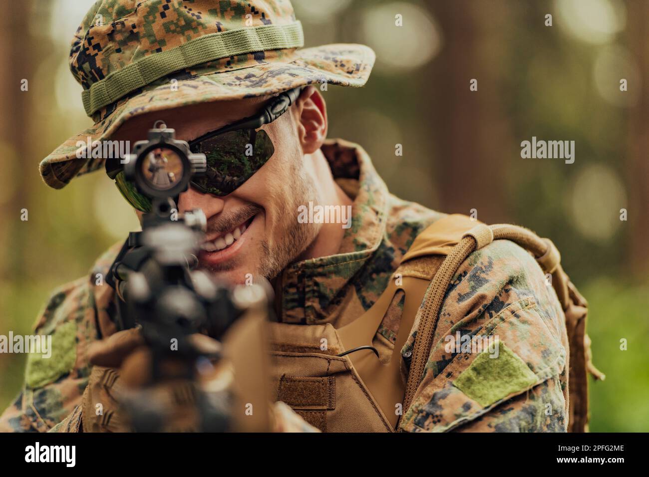 A modern warfare soldier on war duty in dense and dangerous forest ...