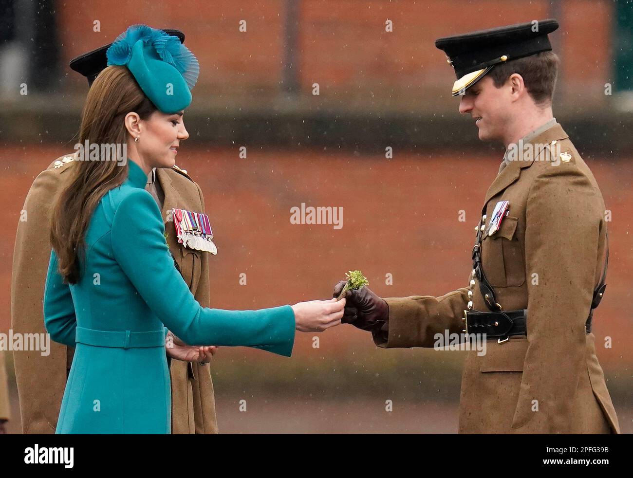 The Princess of Wales presents the traditional sprigs of shamrock to ...