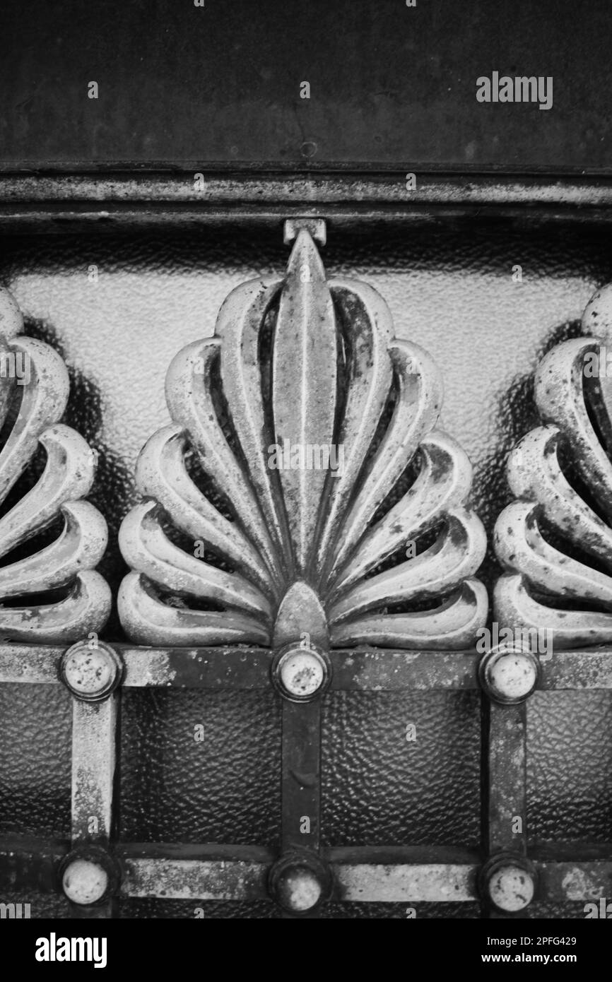 Decorative copper metal fence with decoration in a black and white ...