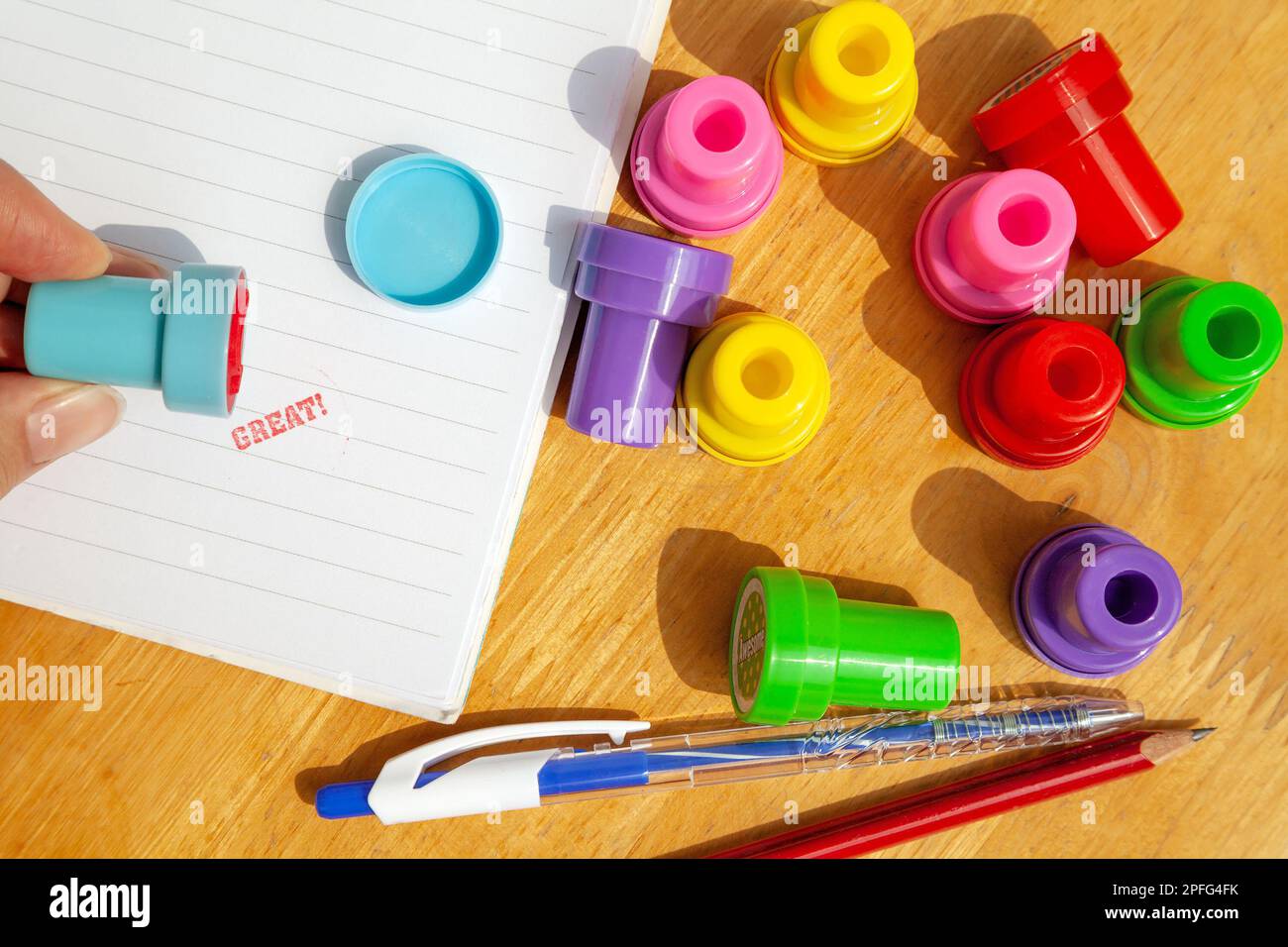 Many various teacher rubber stamps for evaluating students work in ...