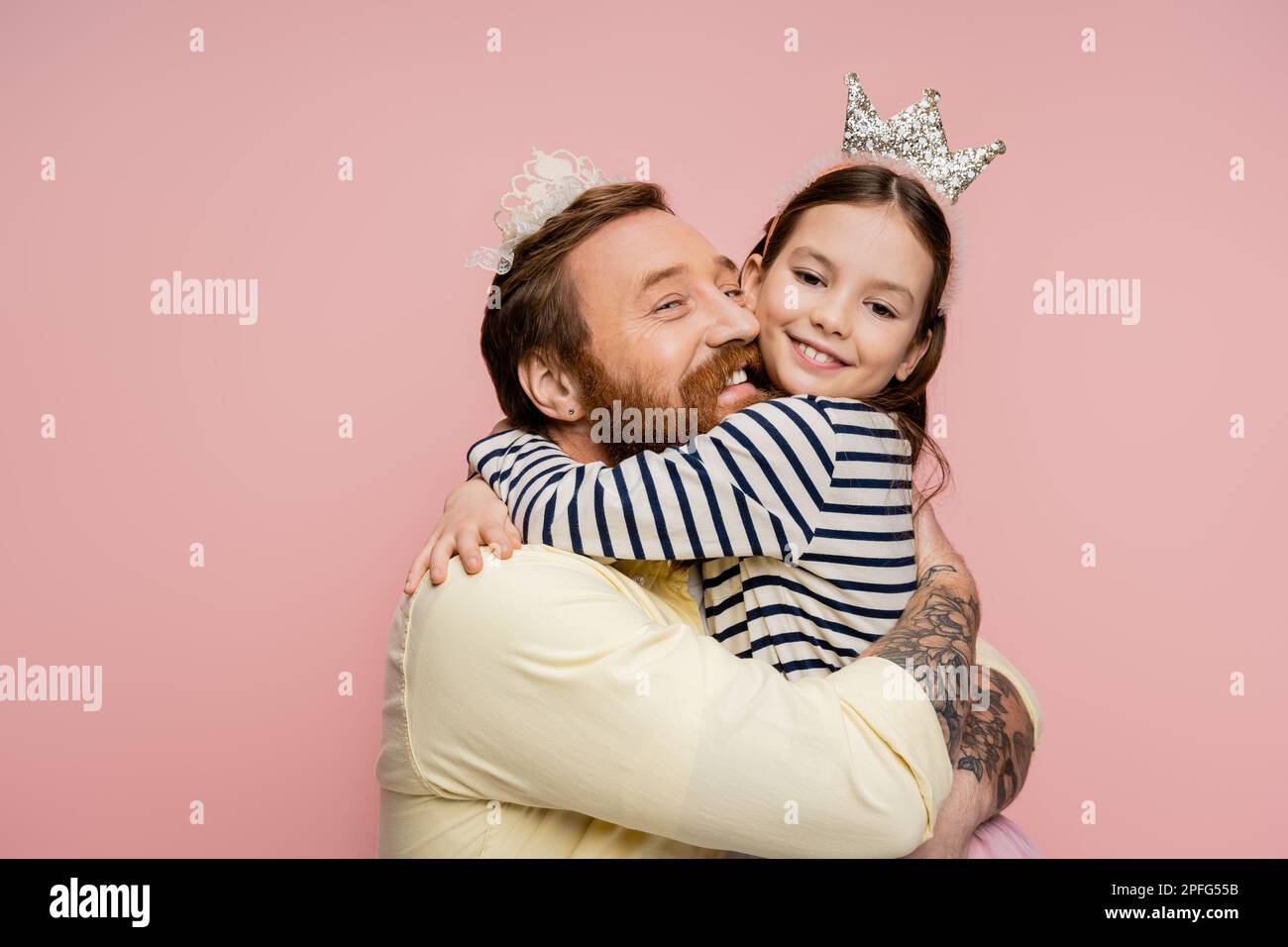 Smiling tattooed man hugging hi-res stock photography and images - Alamy