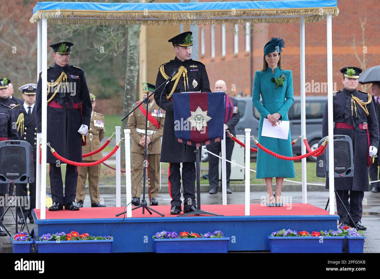 The Prince of Wales speaks on stage with the Princess of Wales during a ...
