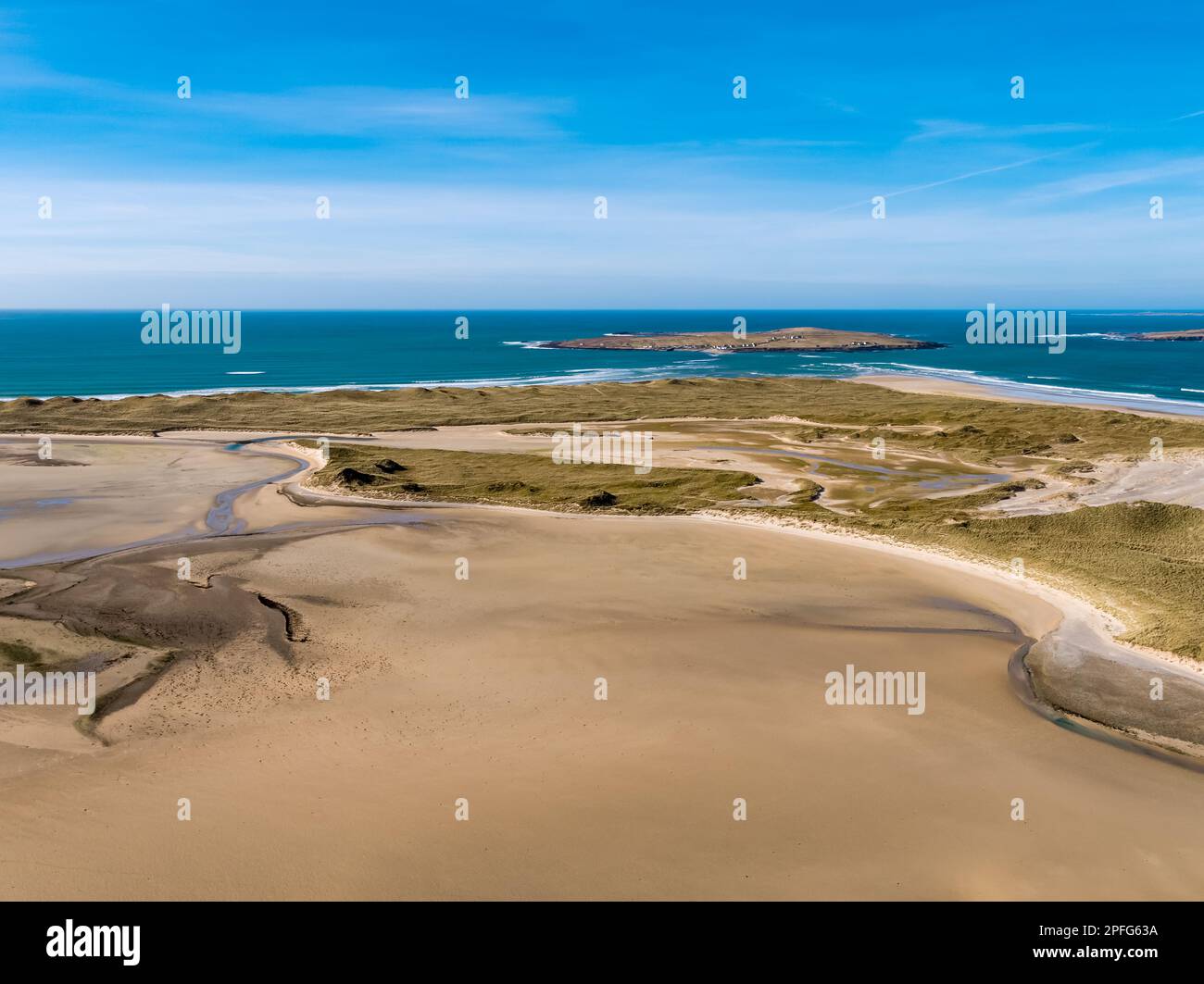 Aerial view of Ballyness Bay and Magheraroarty with the Muckish in the ...