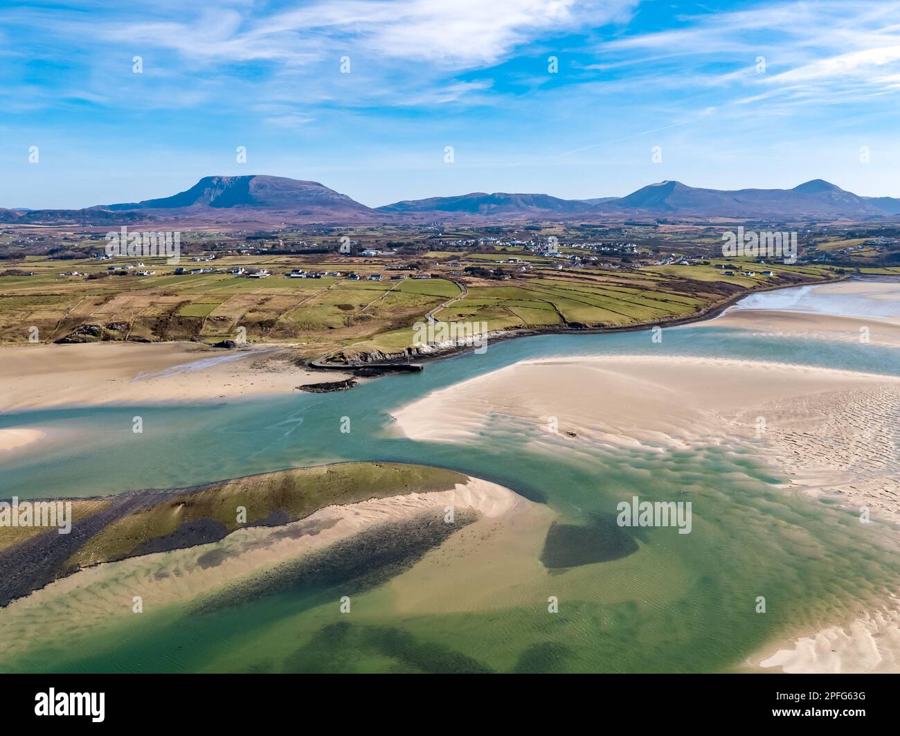 Aerial view of Ballyness Bay and Magheraroarty with the Muckish in the ...