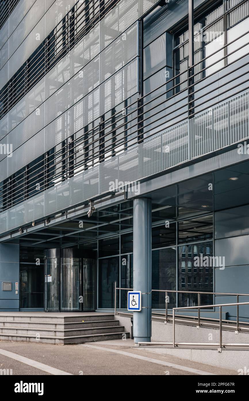 The modern exterior of a university building with disabled access ...