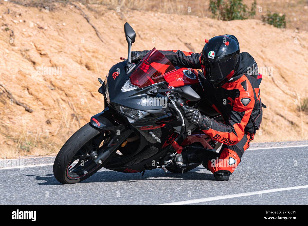 motorist driving in the foreground, captured in the port of navalmoral ...