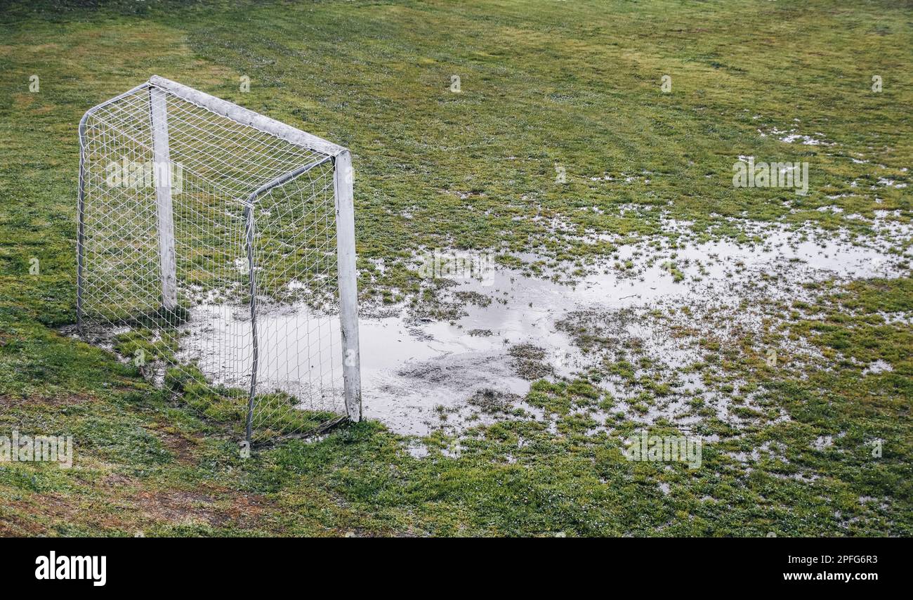 Football field in bad conditions, the grass is waterlogged Stock Photo ...