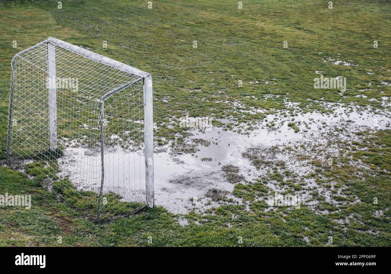 Football field in bad conditions, the grass is waterlogged Stock Photo ...