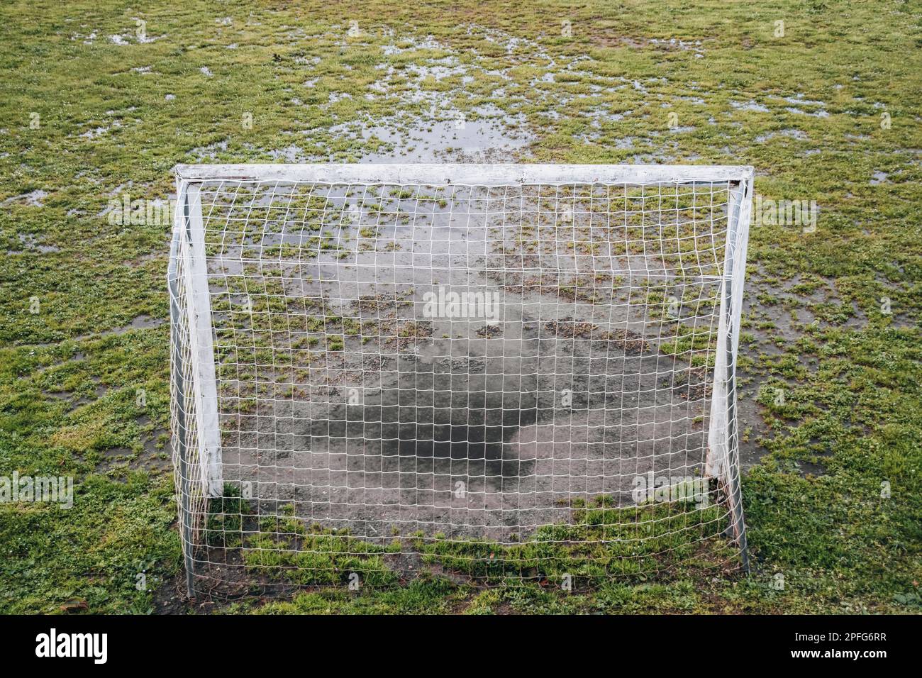 Football field in bad conditions, the grass is waterlogged Stock Photo ...