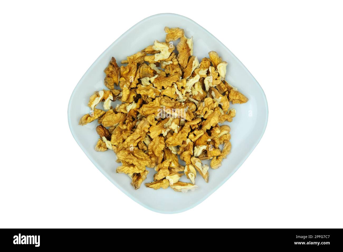 Handful of Walnuts isolated on white background. Top view Stock Photo ...