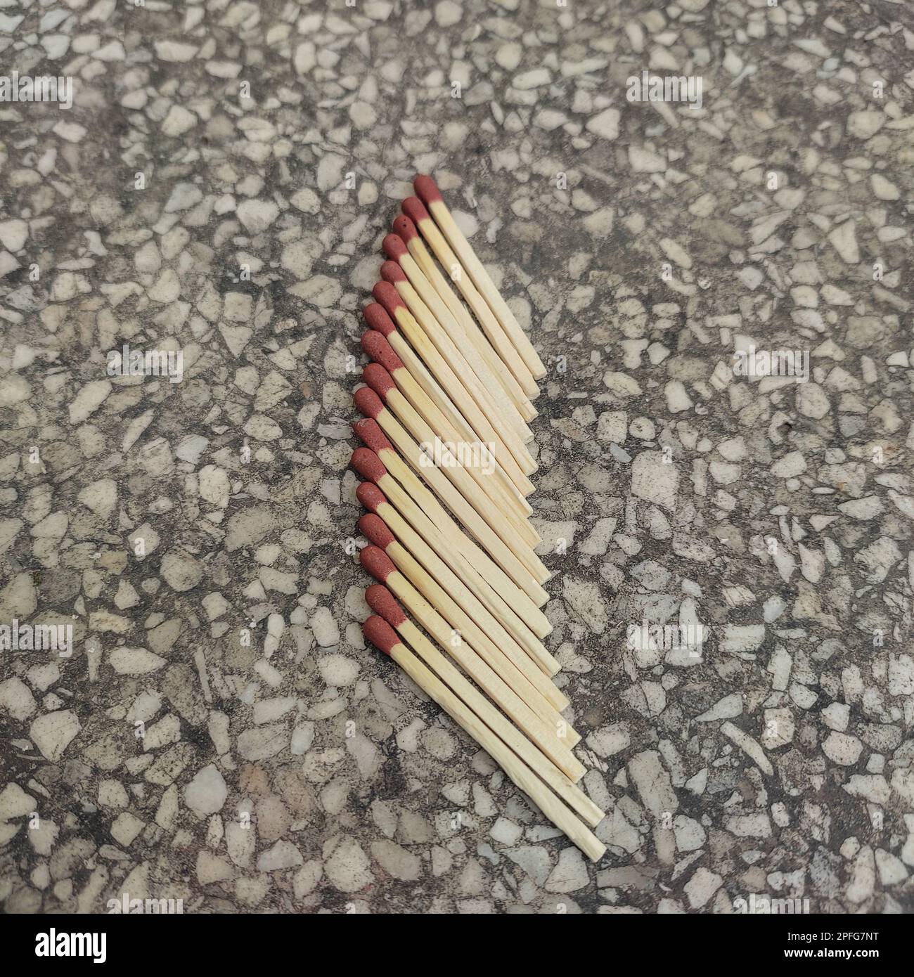 Close up of open single cardboard match box on granite stone background ...