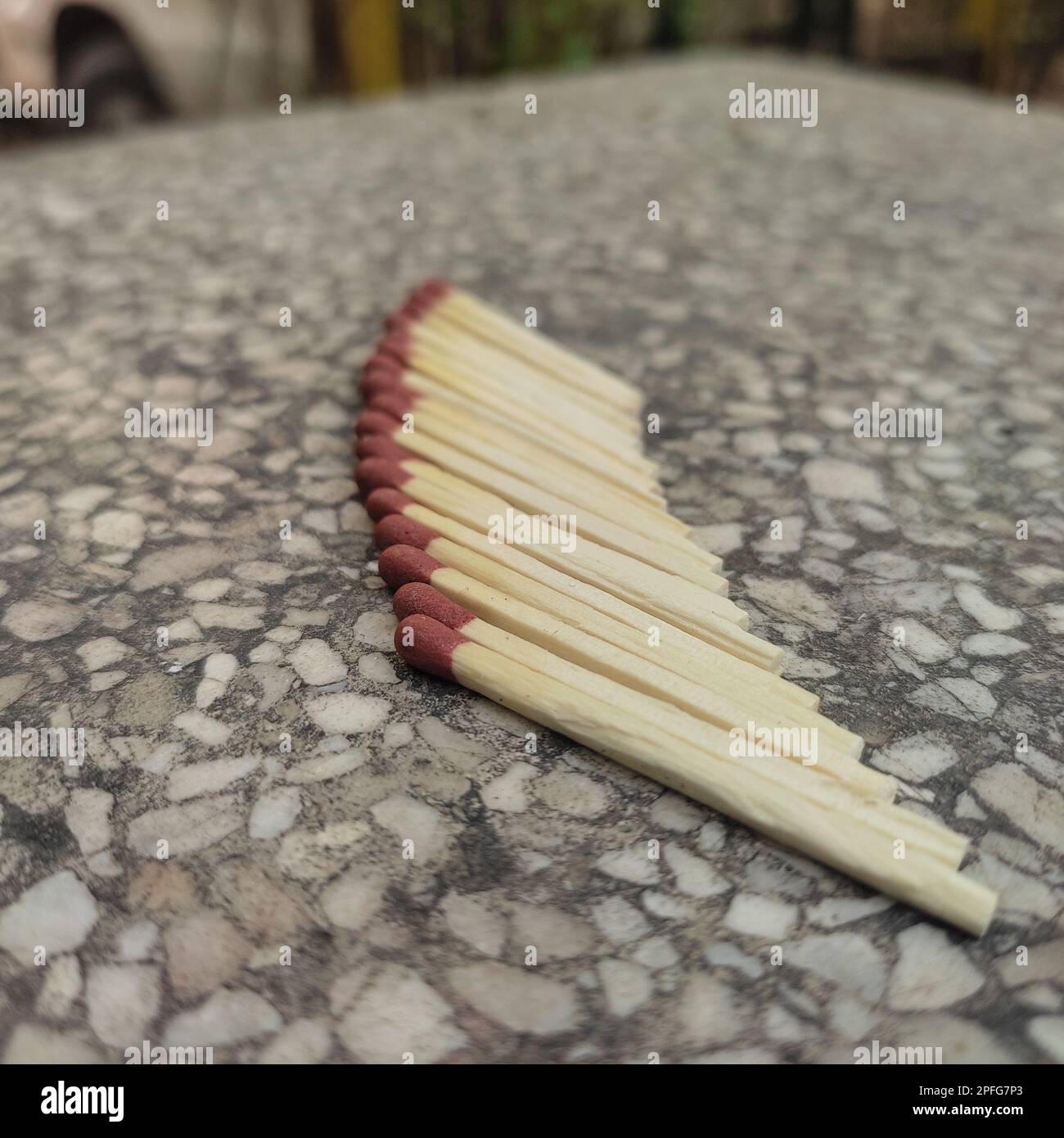 Close up of open single cardboard match box on granite stone background ...