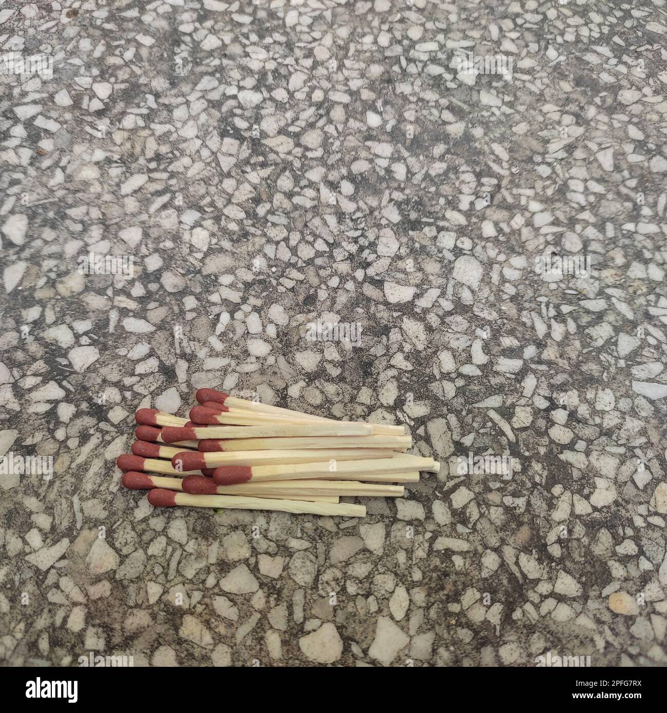 Close up of open single cardboard match box on granite stone background ...