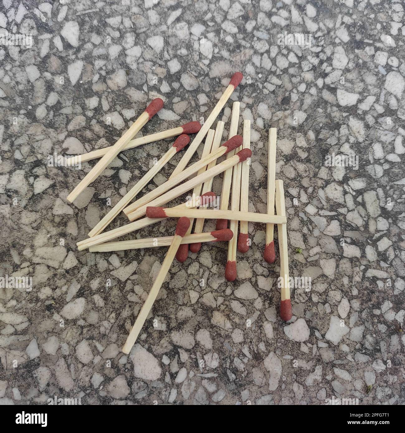 Close up of open single cardboard match box on granite stone background ...
