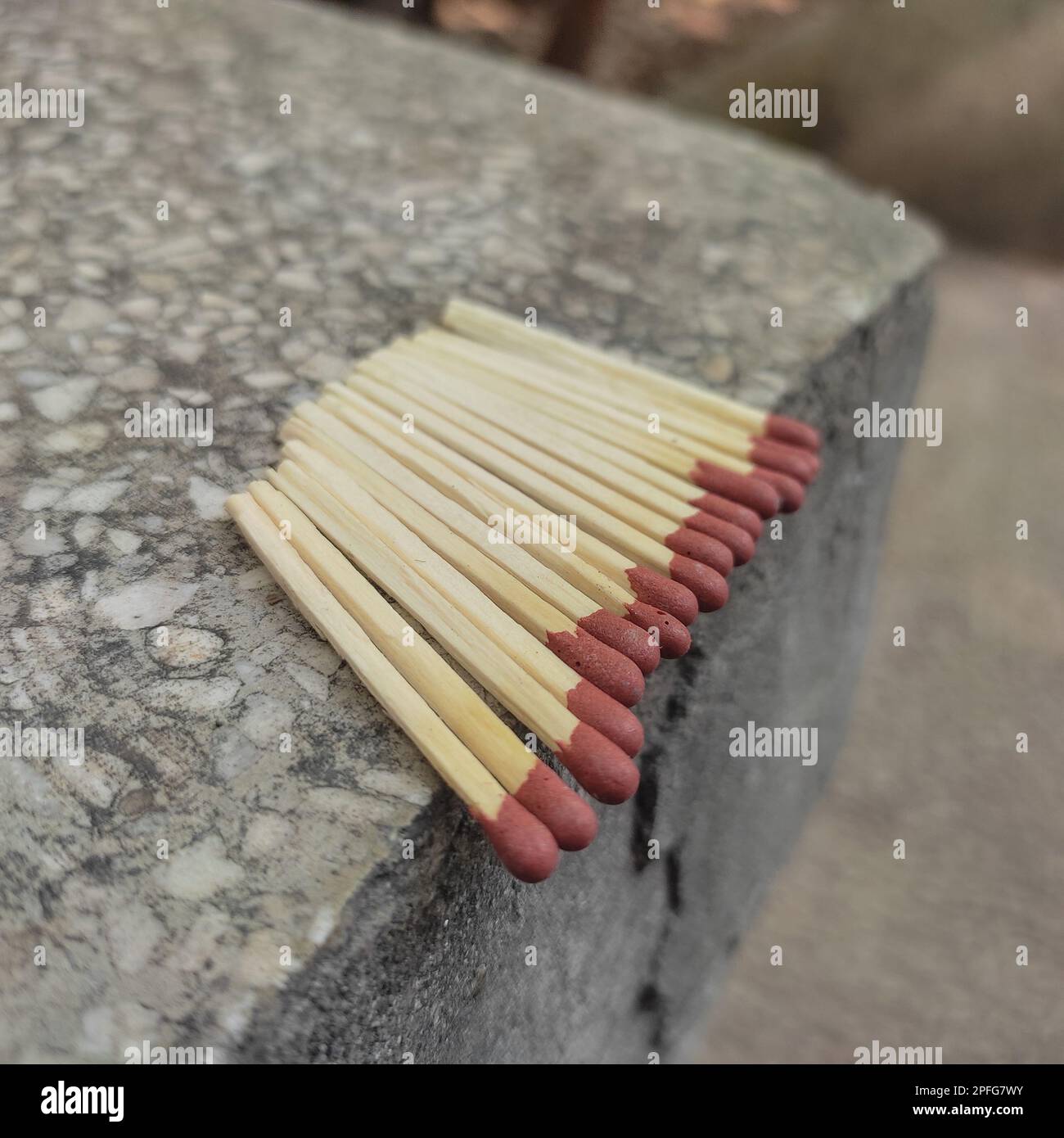 Close up of open single cardboard match box on granite stone background ...