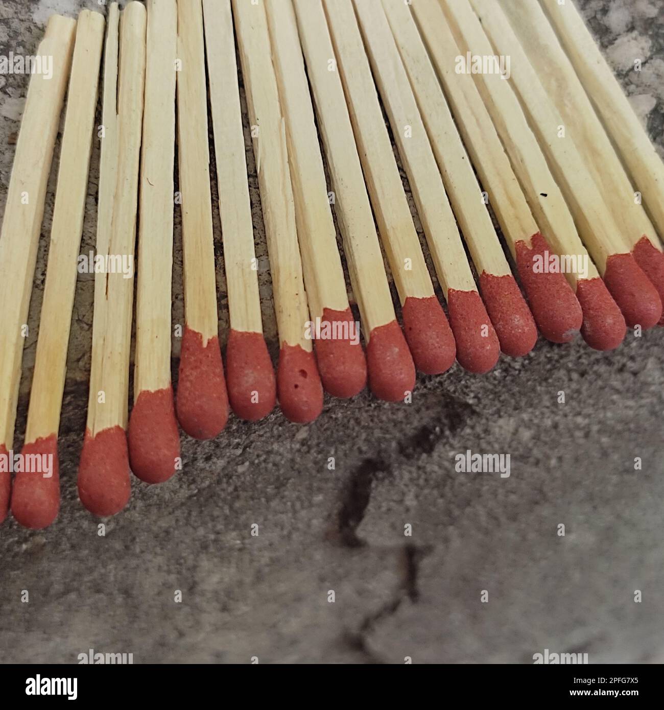 Close up of open single cardboard match box on granite stone background ...