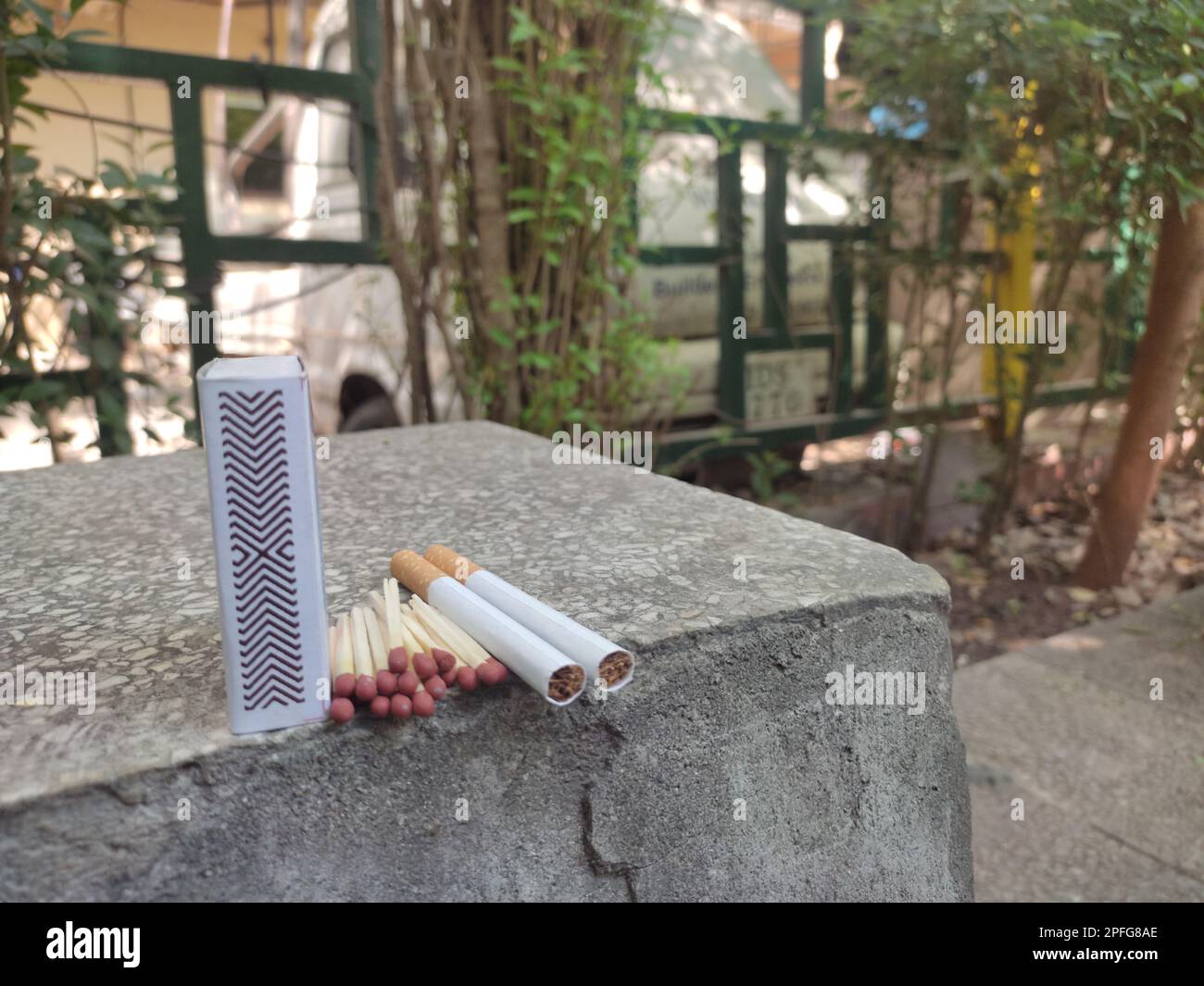Close up of open single cardboard match box on granite stone background ...