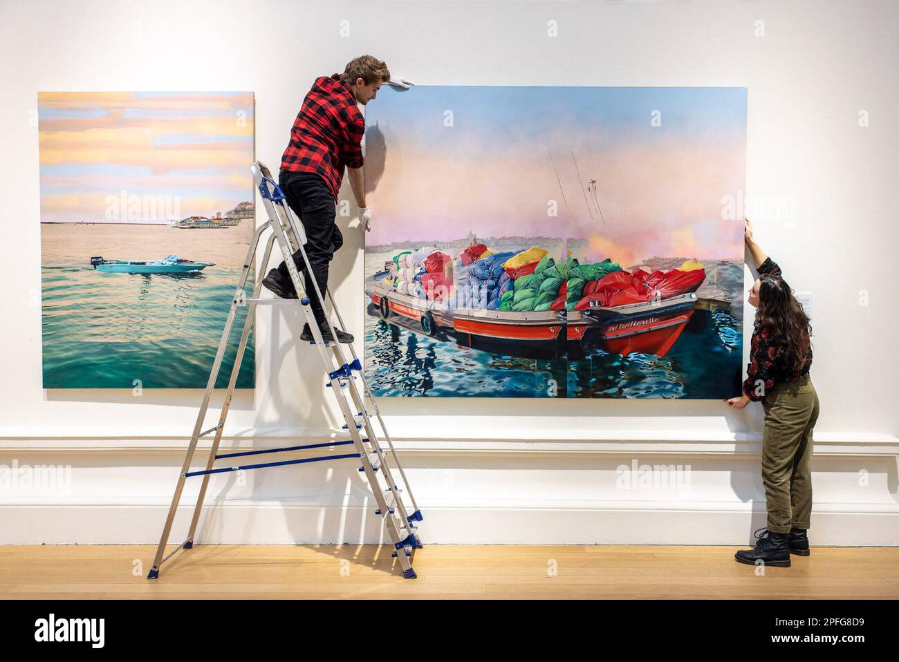 Edinburgh, United Kingdom. 17 March, 2023 Pictured: Gallery Assistants ...