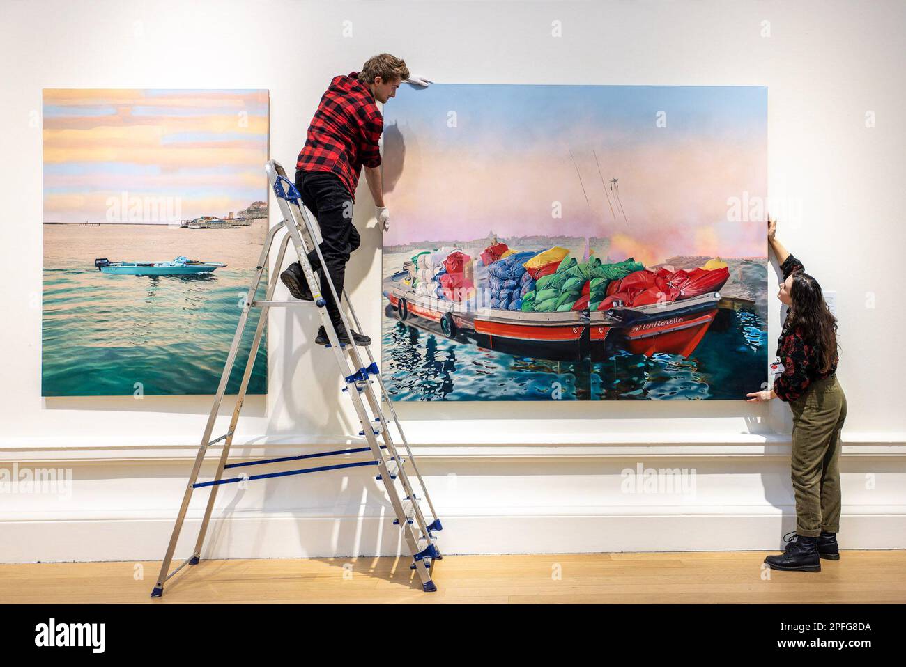 Edinburgh, United Kingdom. 17 March, 2023 Pictured: Gallery Assistants ...