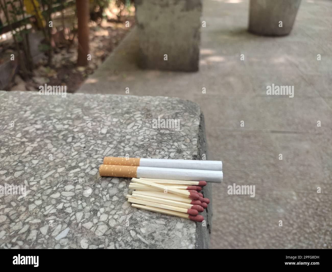Close up of open single cardboard match box on granite stone background ...