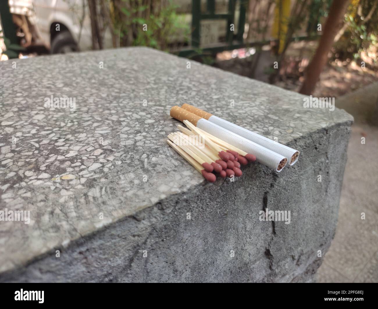 Close up of open single cardboard match box on granite stone background ...