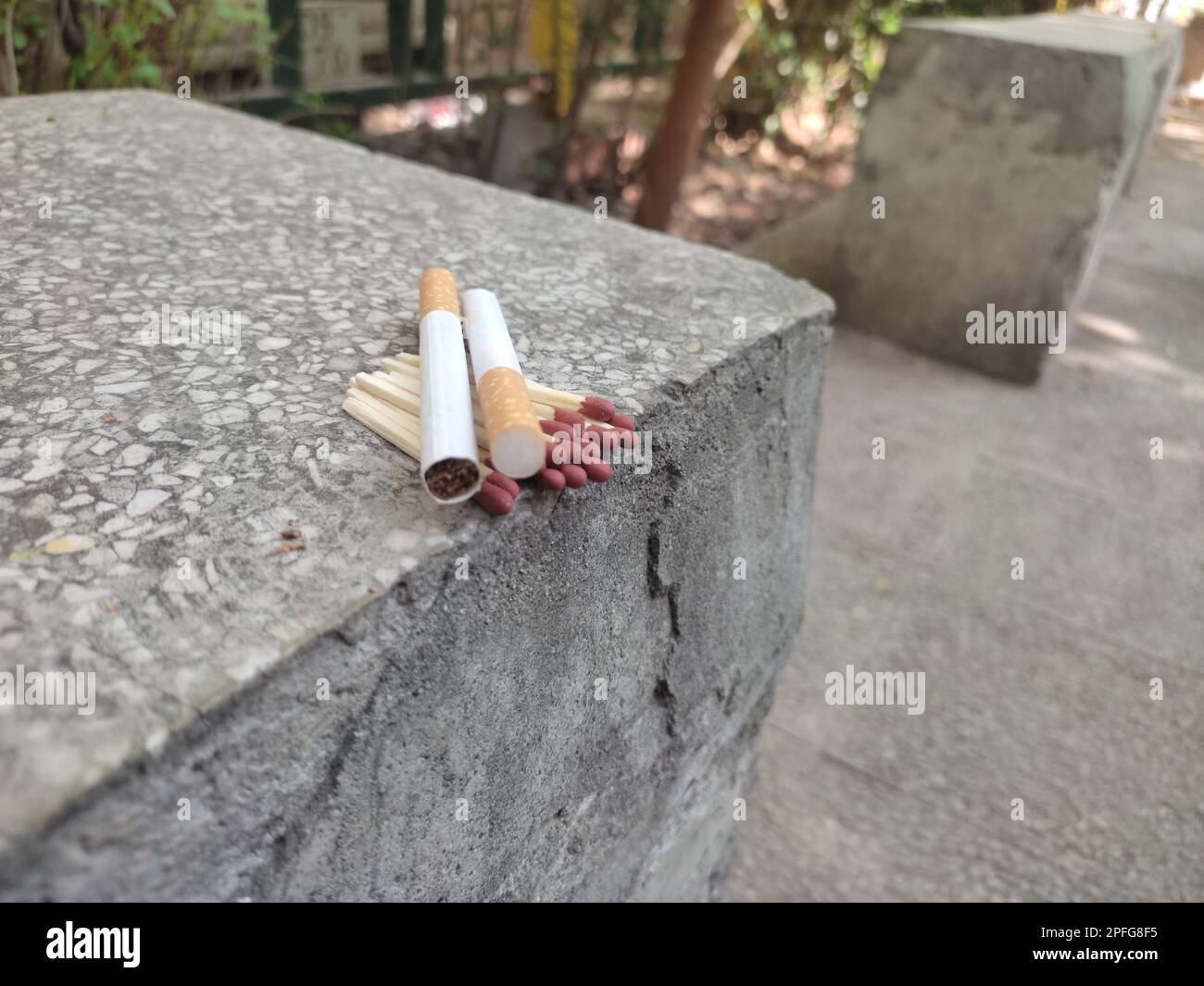 Close up of open single cardboard match box on granite stone background ...