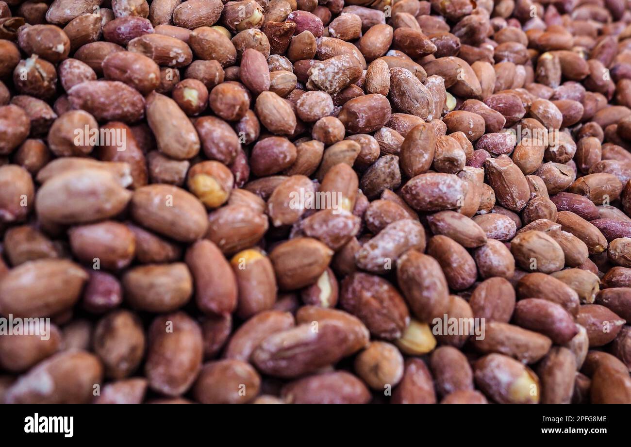 Healthy roasted unpeeled peanuts hi-res stock photography and images ...