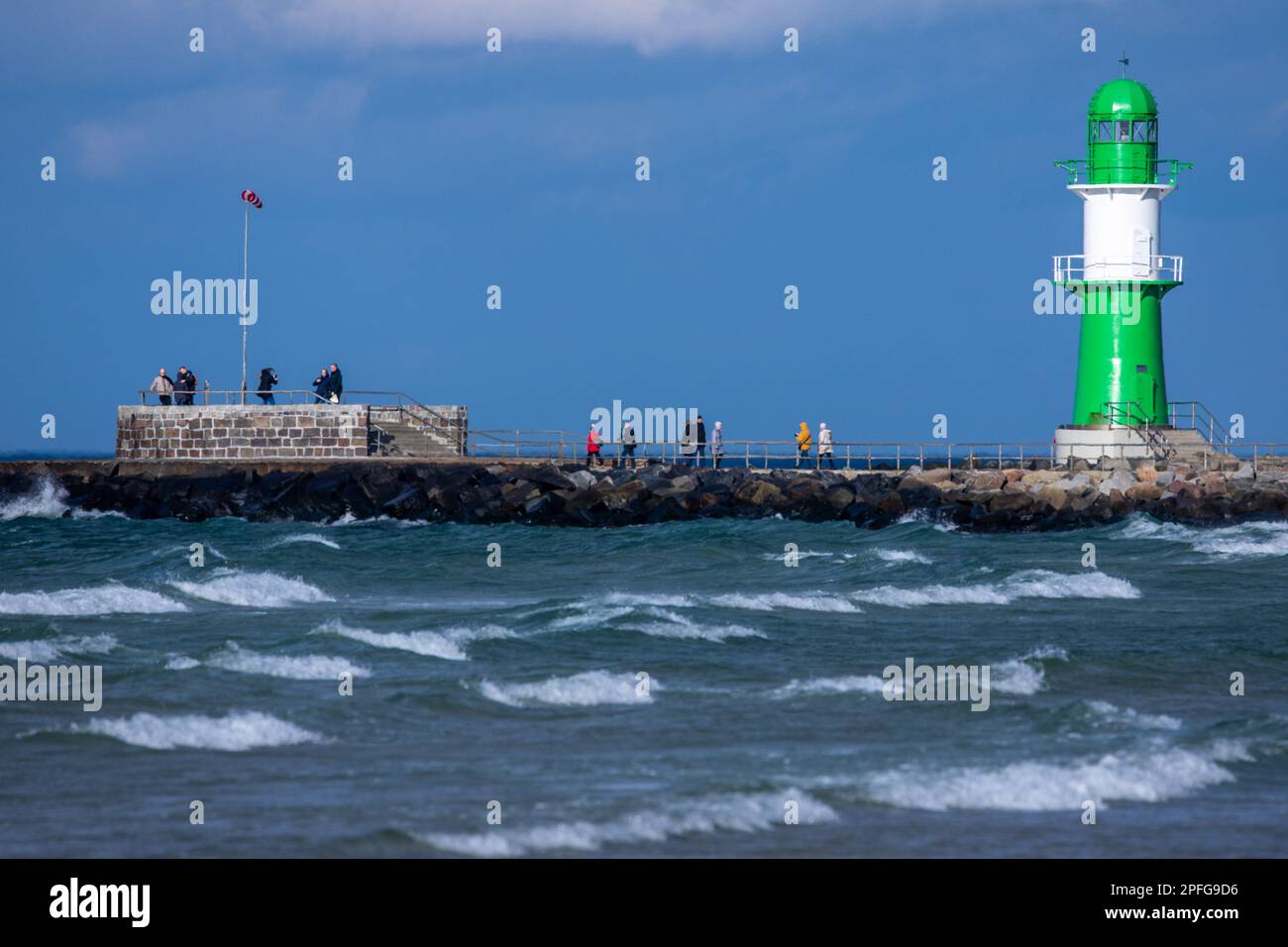 13 March 2023, Mecklenburg-Western Pomerania, Warnemünde: The pier with ...