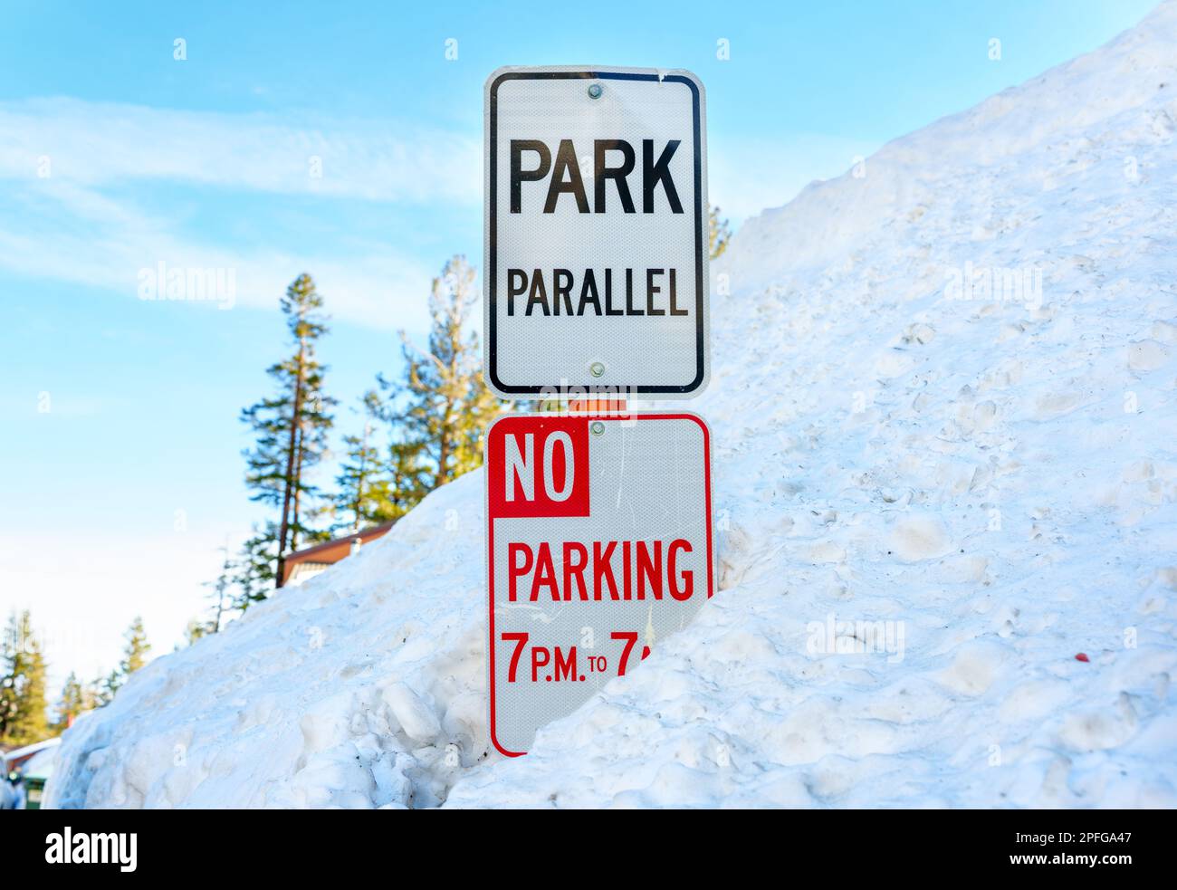 Winter sports and safety: Parking time and Park Parallel signs in a ...