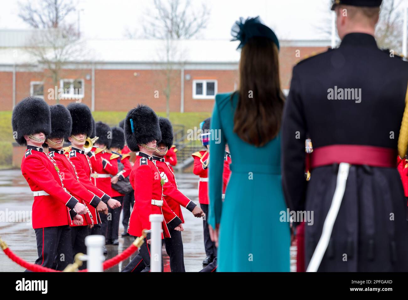 The Prince and Princess of Wales watch a march-past during a visit to ...