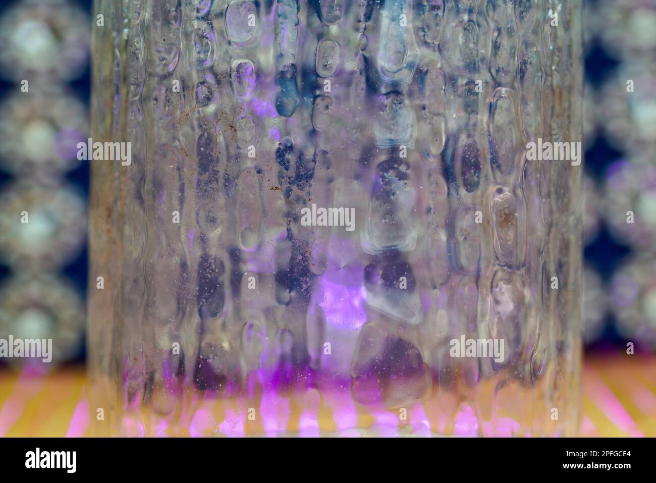 Glass made of crystal-like materials photographed in the studio with ...