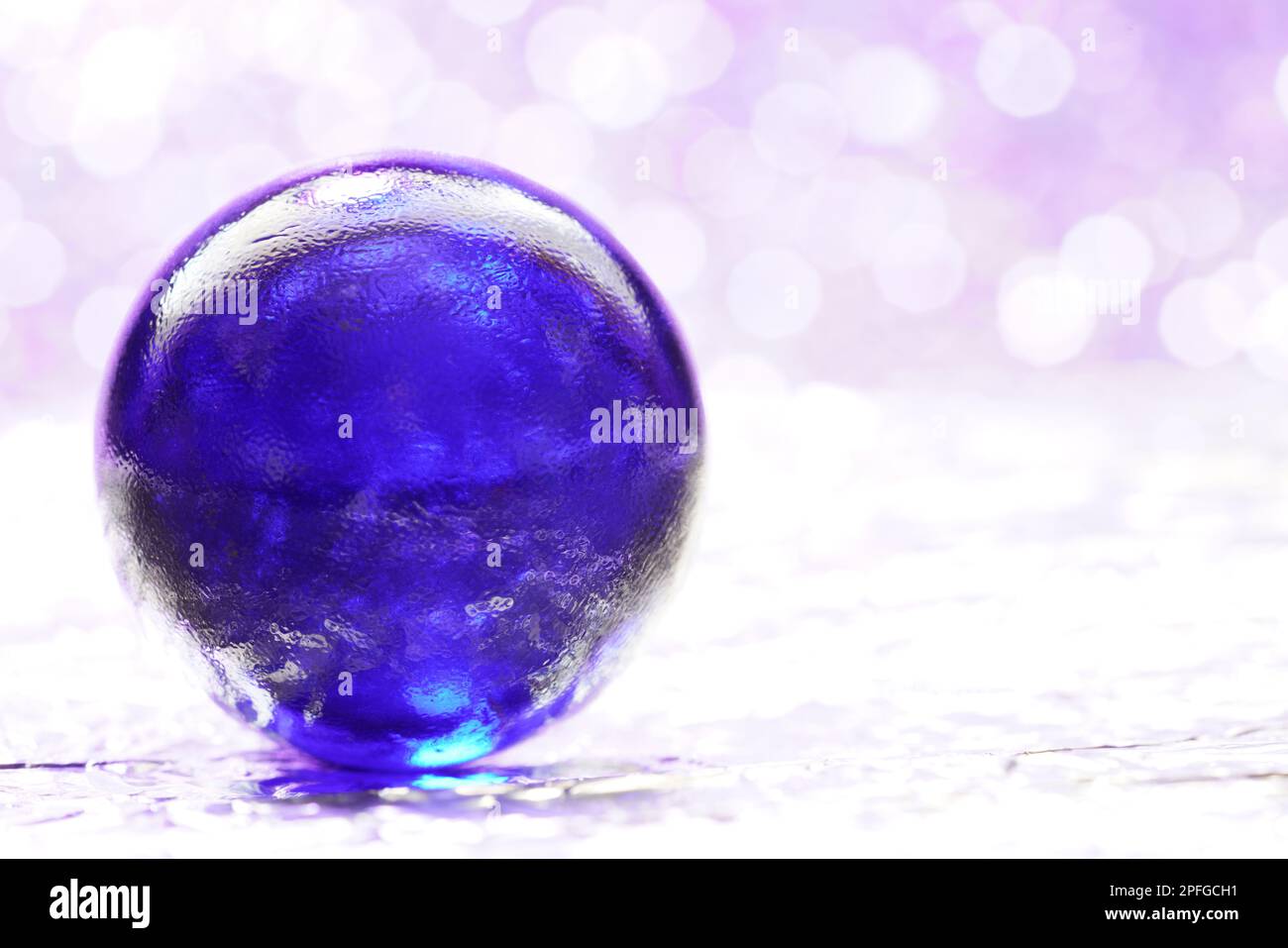 Glass made of crystal-like materials photographed in the studio with ...