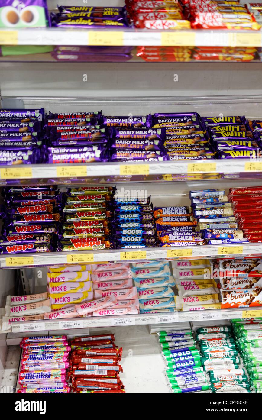 Sweets on shelves in shop Stock Photo - Alamy