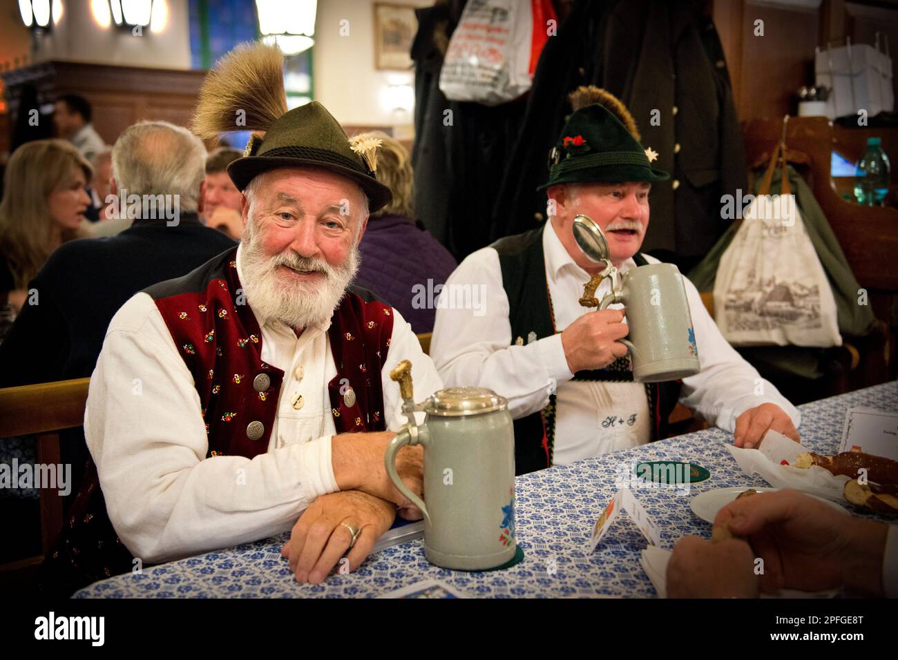 Germany, Bavaria, Munich, Hofbrauhaus beer house, elders in traditional ...